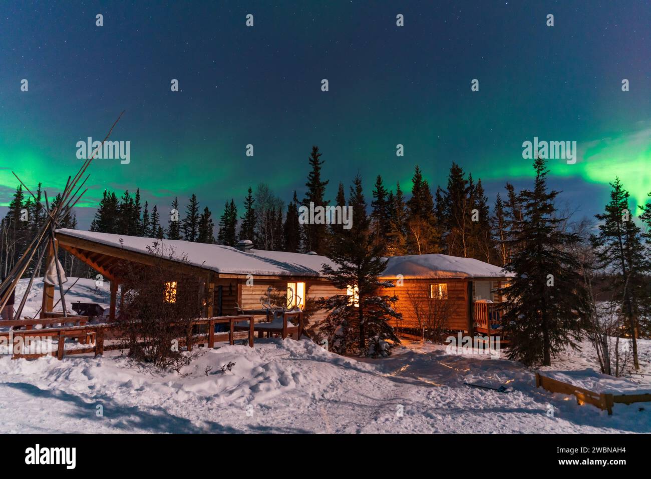Aurora Borealis, Northern Lights, over aboriginal wooden cabin at ...