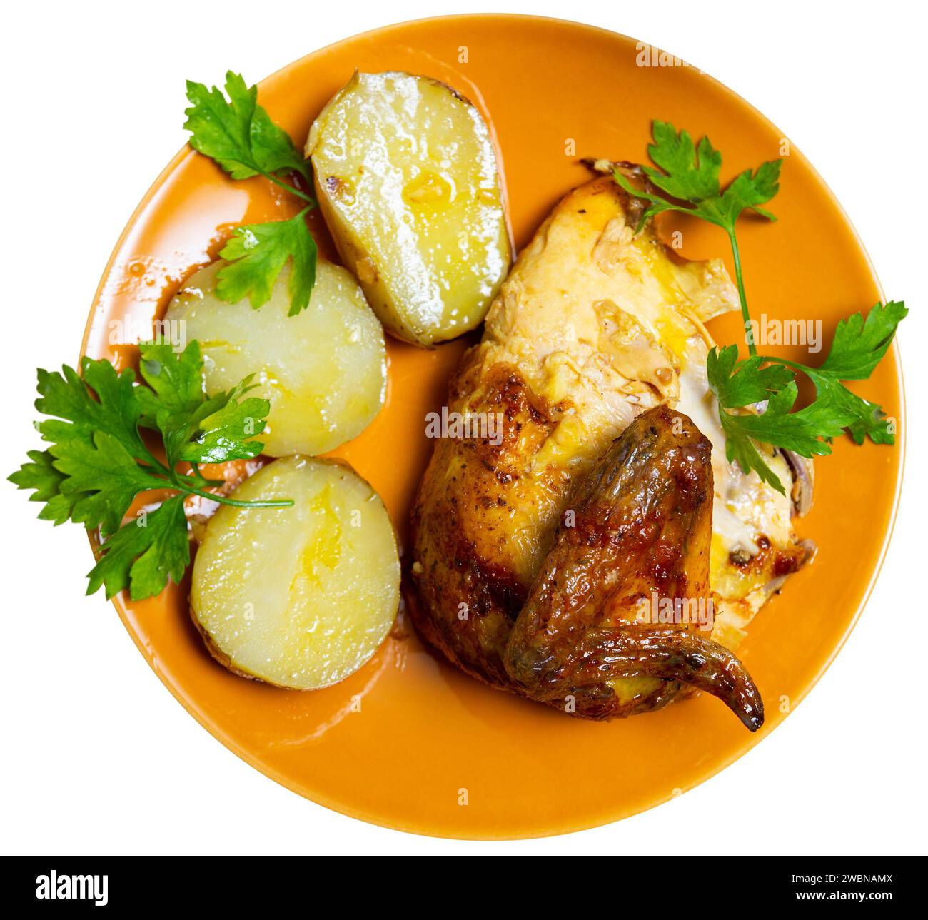 Chicken served with potatoes on platter Stock Photo - Alamy