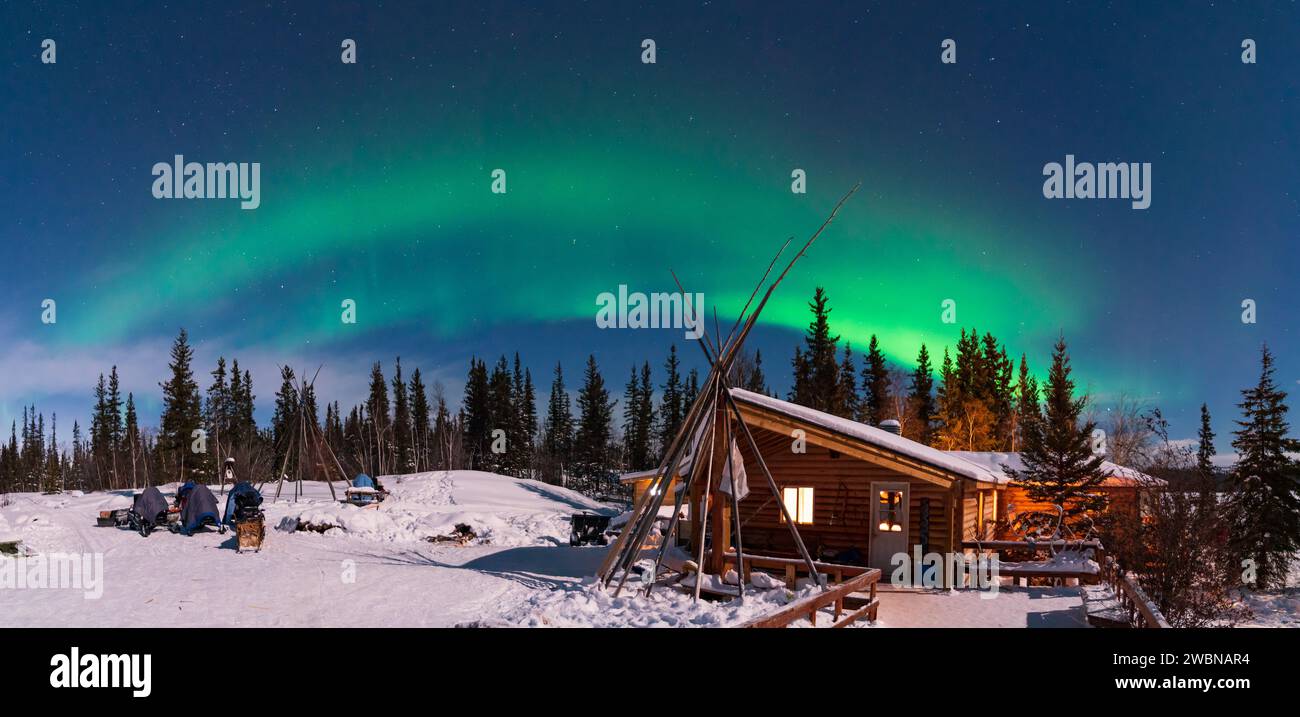 Panorama of Aurora Borealis, Northern Lights, over aboriginal wooden ...