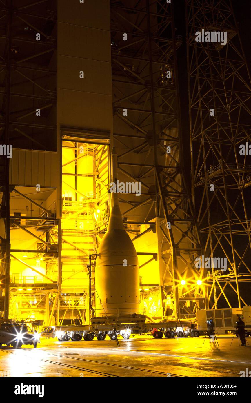 The Orion spacecraft and its transporter stand at the base of the ...