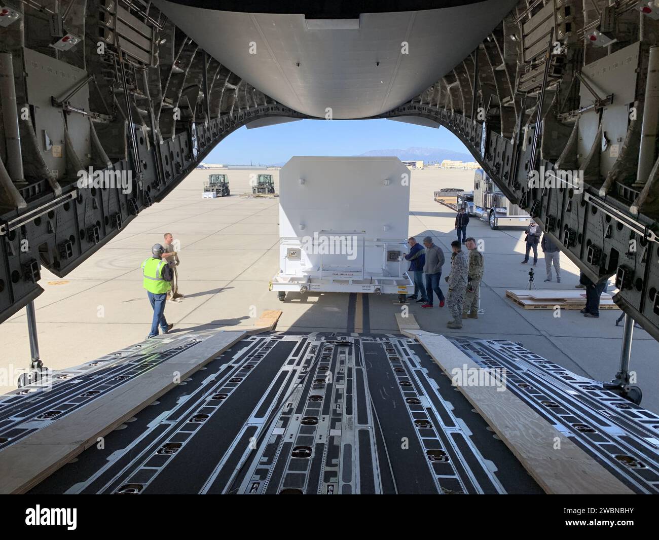 The shipping container carrying NASA's Mars 2020 rover is readied for ...