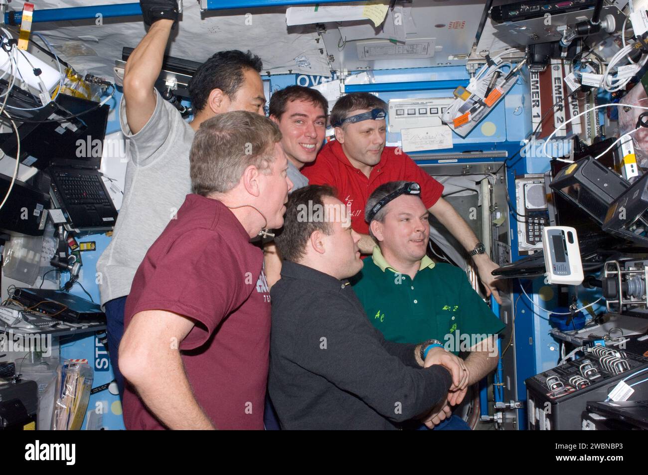 ISS028-E-014701 (8 July 2011) --- Expedition 28 crew members watch the ...