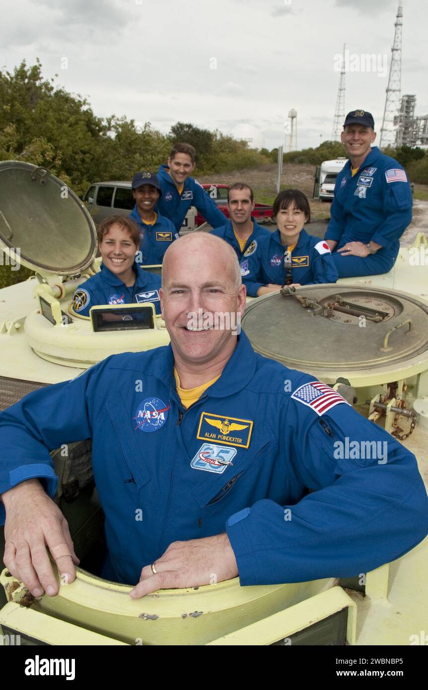 STS-131 crew posed atop an M-113 armored personnel carrier at Kennedy ...