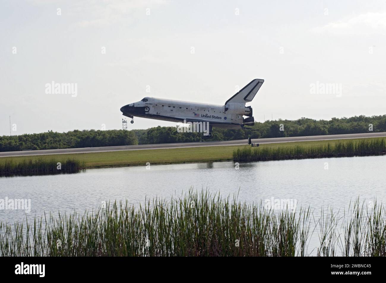 CAPE CANAVERAL, Fla. - Space shuttle Discovery appears to hover above ...