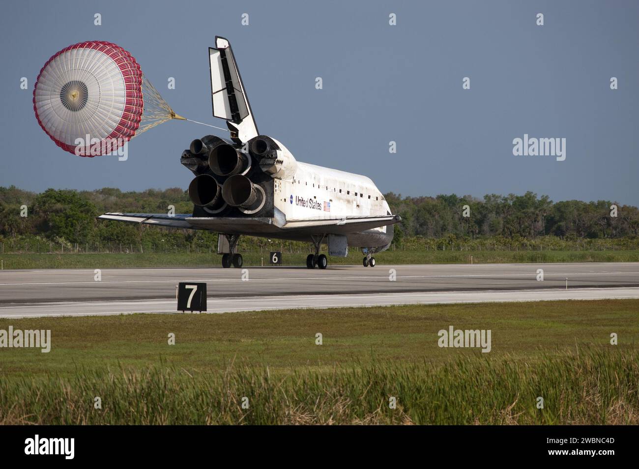 CAPE CANAVERAL, Fla. - With drag chute unfurled, space shuttle ...