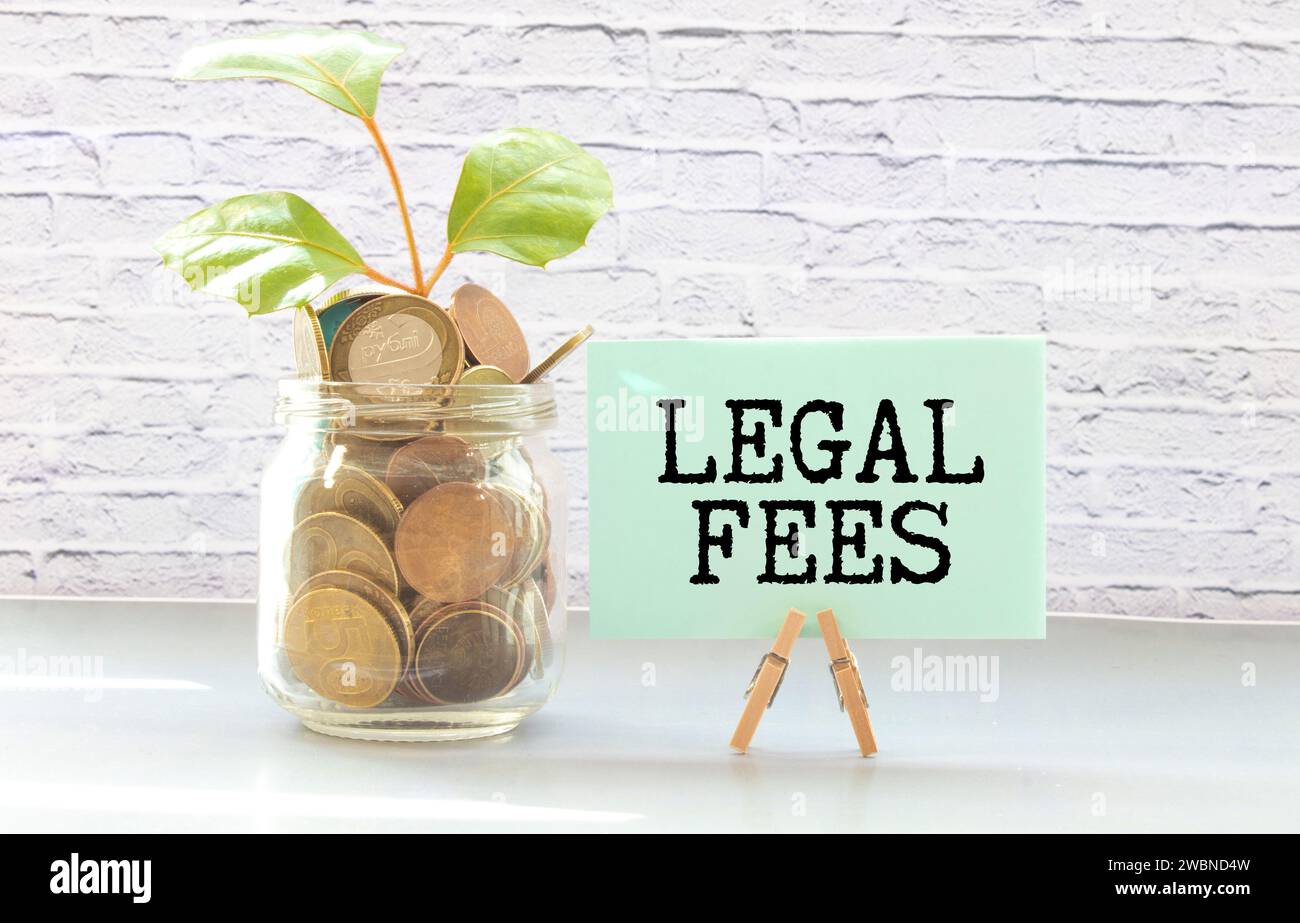 LEGAL FEES text on notebook with pen on a chart background Stock Photo ...