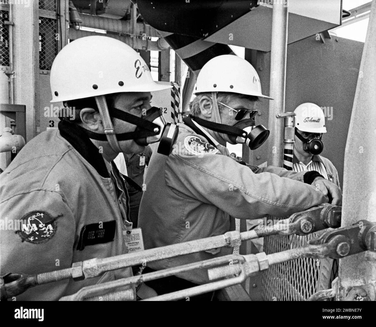 Apollo 17 Mission commander, Eugene A. Cernan, in center is flanked by ...