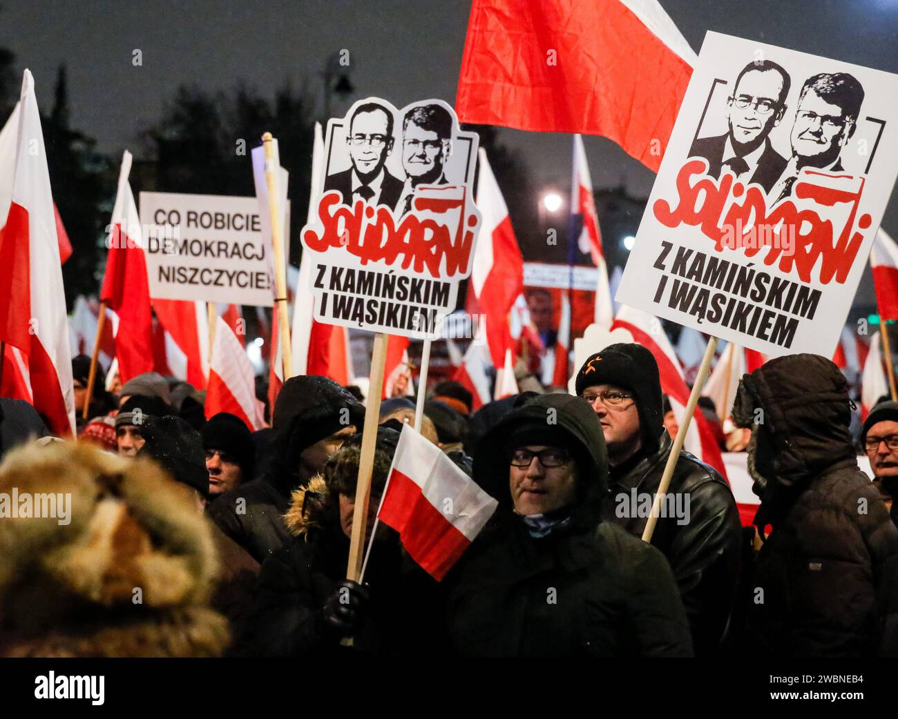 Warsaw, Poland, 11th of January 2024. Crowds of people, holding Polish ...
