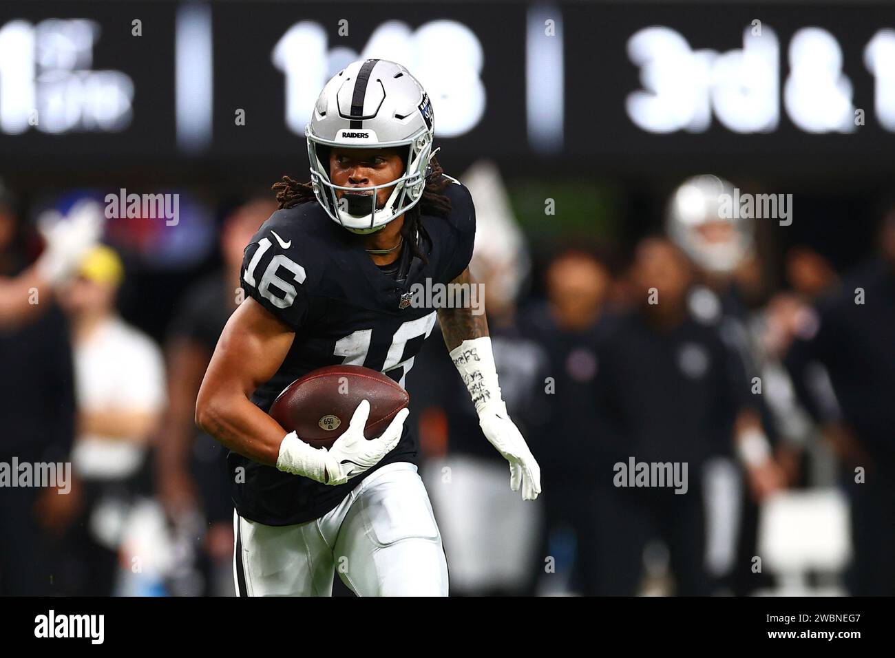 Las Vegas Raiders wide receiver Jakobi Meyers runs the ball during an NFL football game against ...