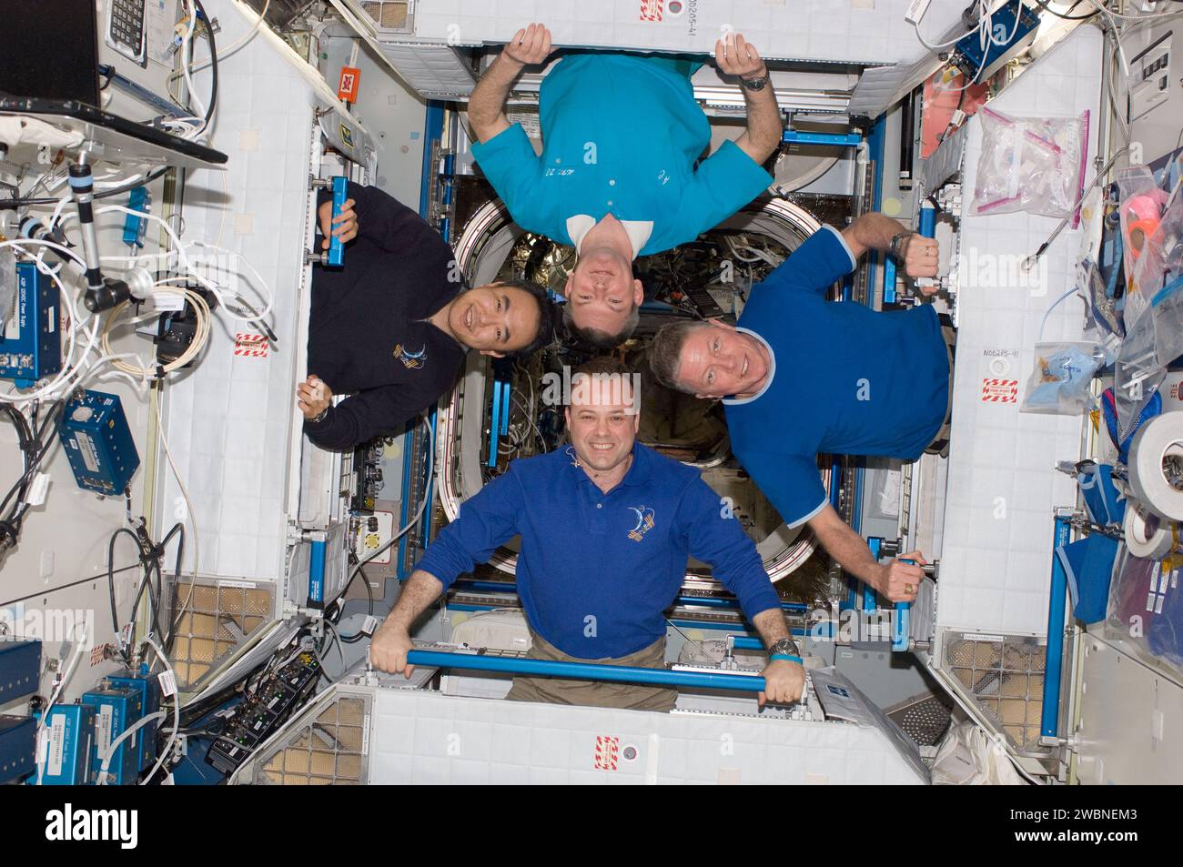 ISS028-E-048379 (12 Sept. 2011) --- Four of the six Expedition 28 crew ...