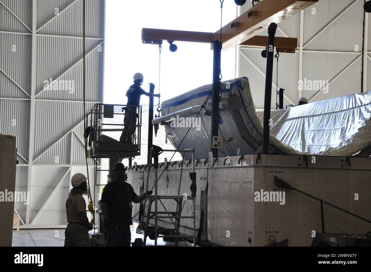 Workers at Vandenberg Air Force Base installed a fairing on NASA's OCO ...