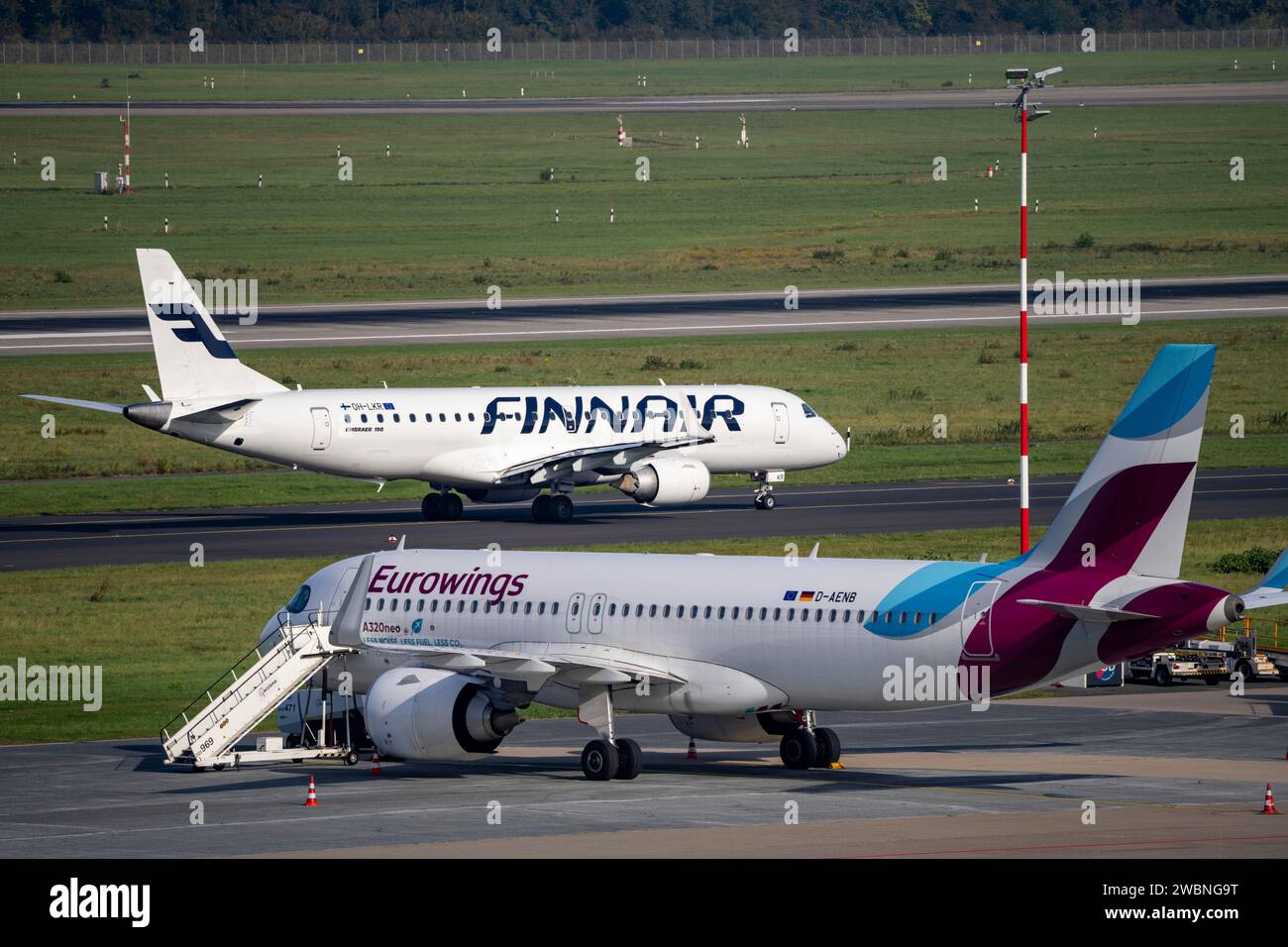 Düsseldorf Airport, Finnair Embraer ERJ-190, on the taxiway, Eurowings ...