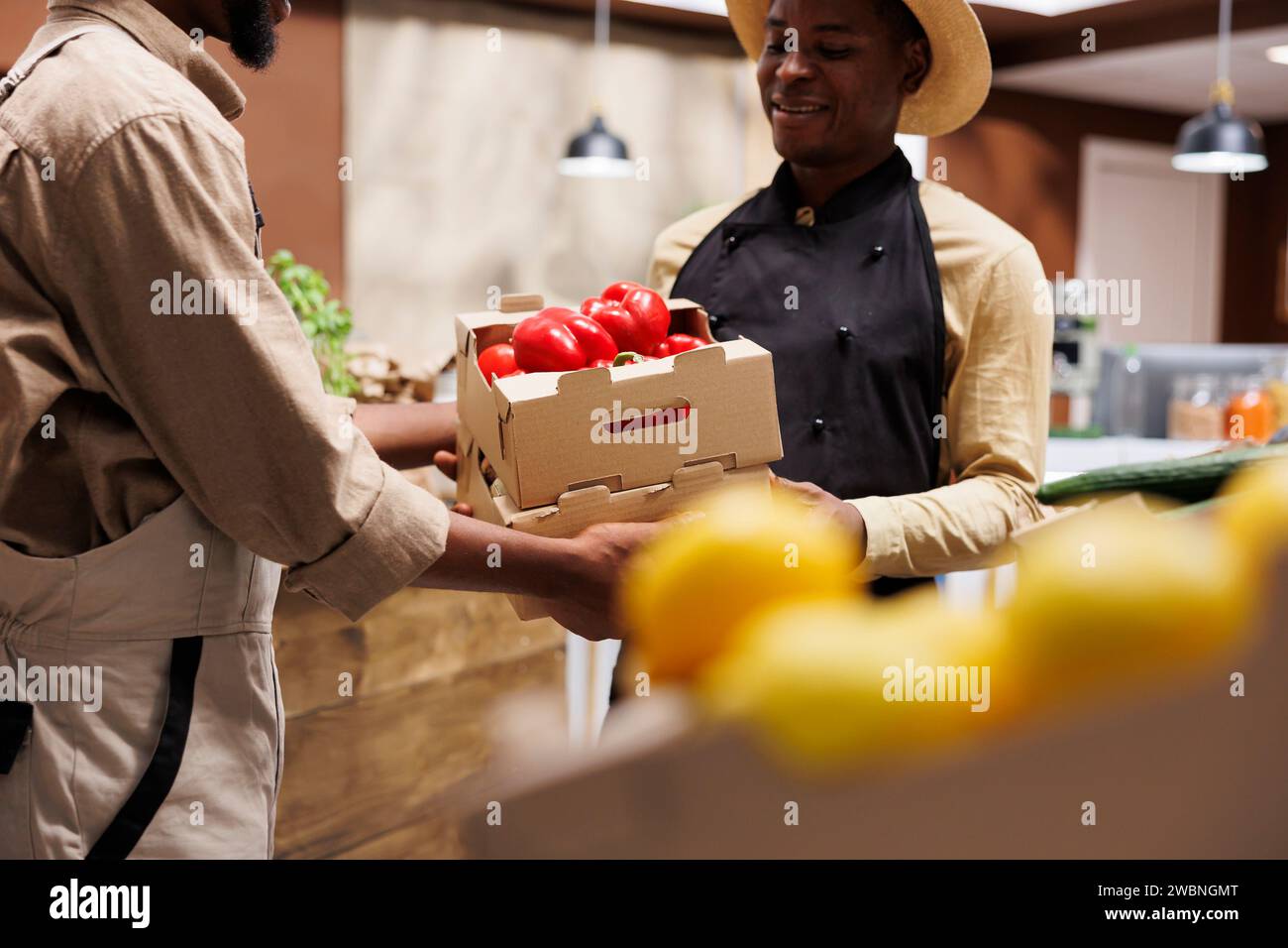 African man basket fresh fruit hi-res stock photography and images - Alamy