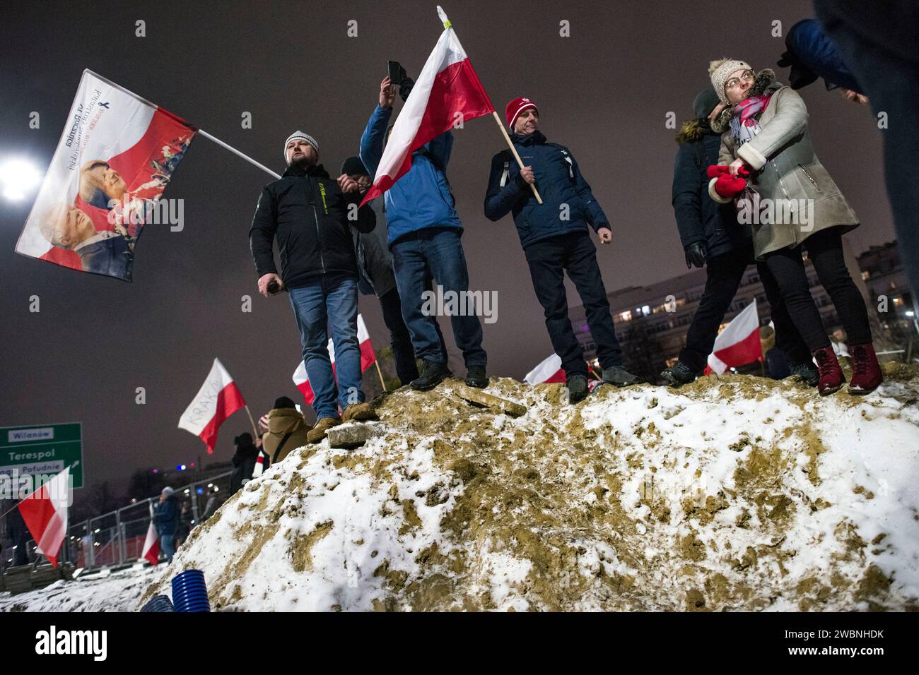 Protesters wave Polish flags during the demonstration. Poland's right ...