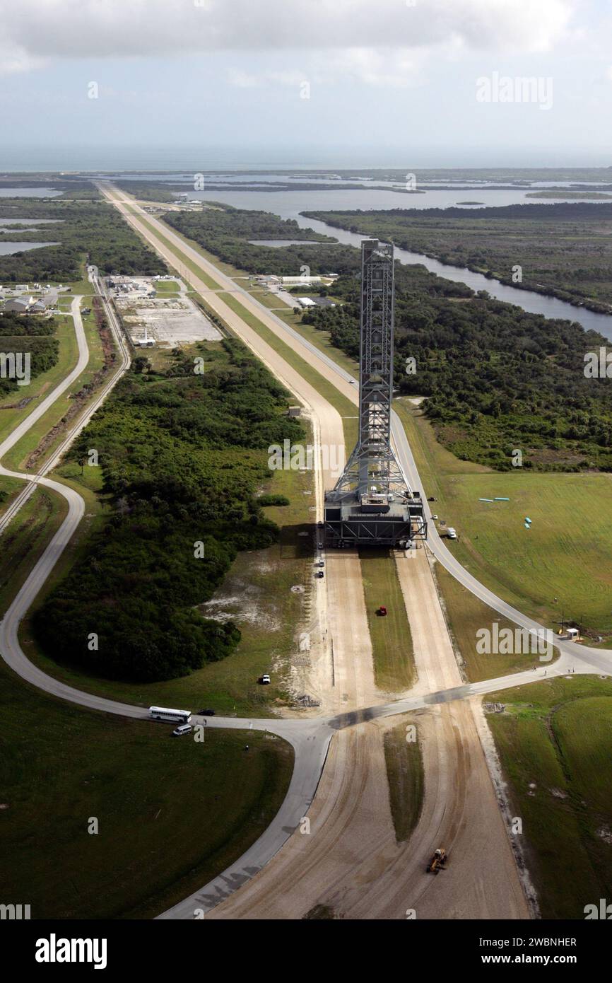 The mobile launcher is transported to Launch Pad 39B, captured in a ...