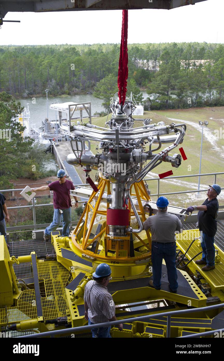 Stennis Space Center employees install the J-2X powerpack Dec. 5 in ...