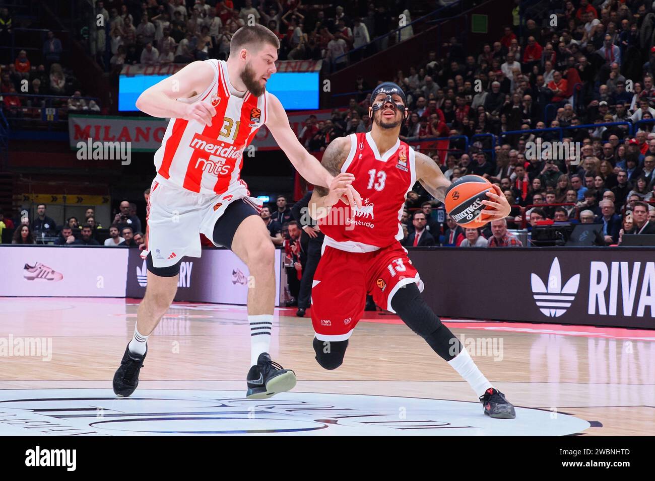 Milan, Italy. 11th Jan, 2024. Shabaz Napier (EA7 Emporio Armani Olimpia Milano) & Giedraitis ...