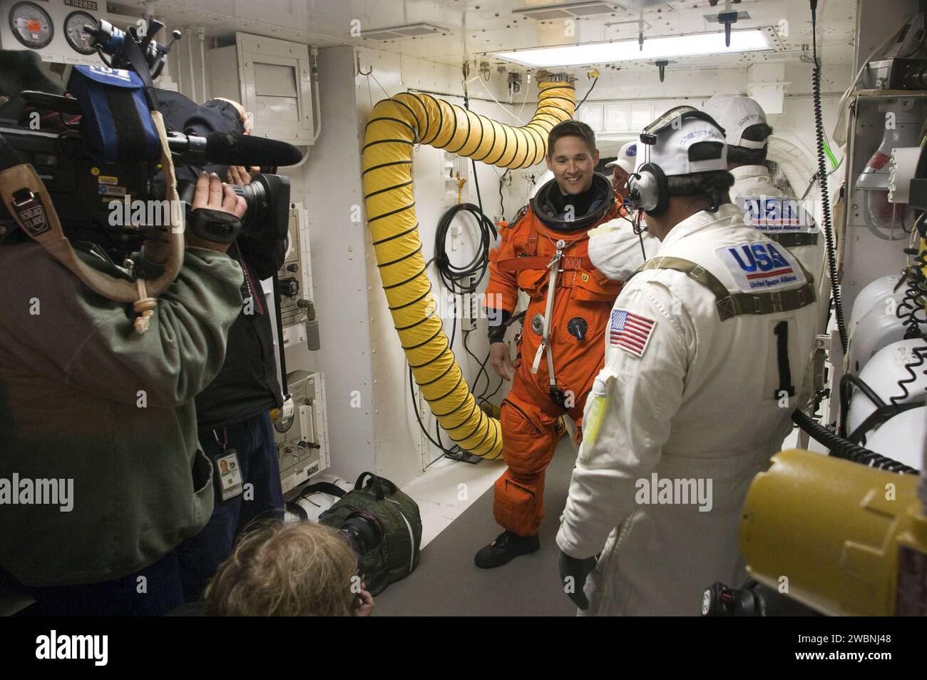 STS-131 Pilot James P. Dutton Jr. prepares to enter space shuttle ...