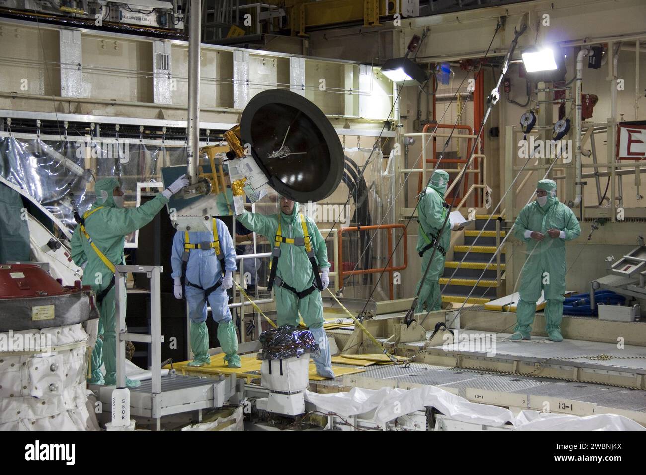 CAPE CANAVERAL, Fla. -- Technicians install a new Ku-Band ...