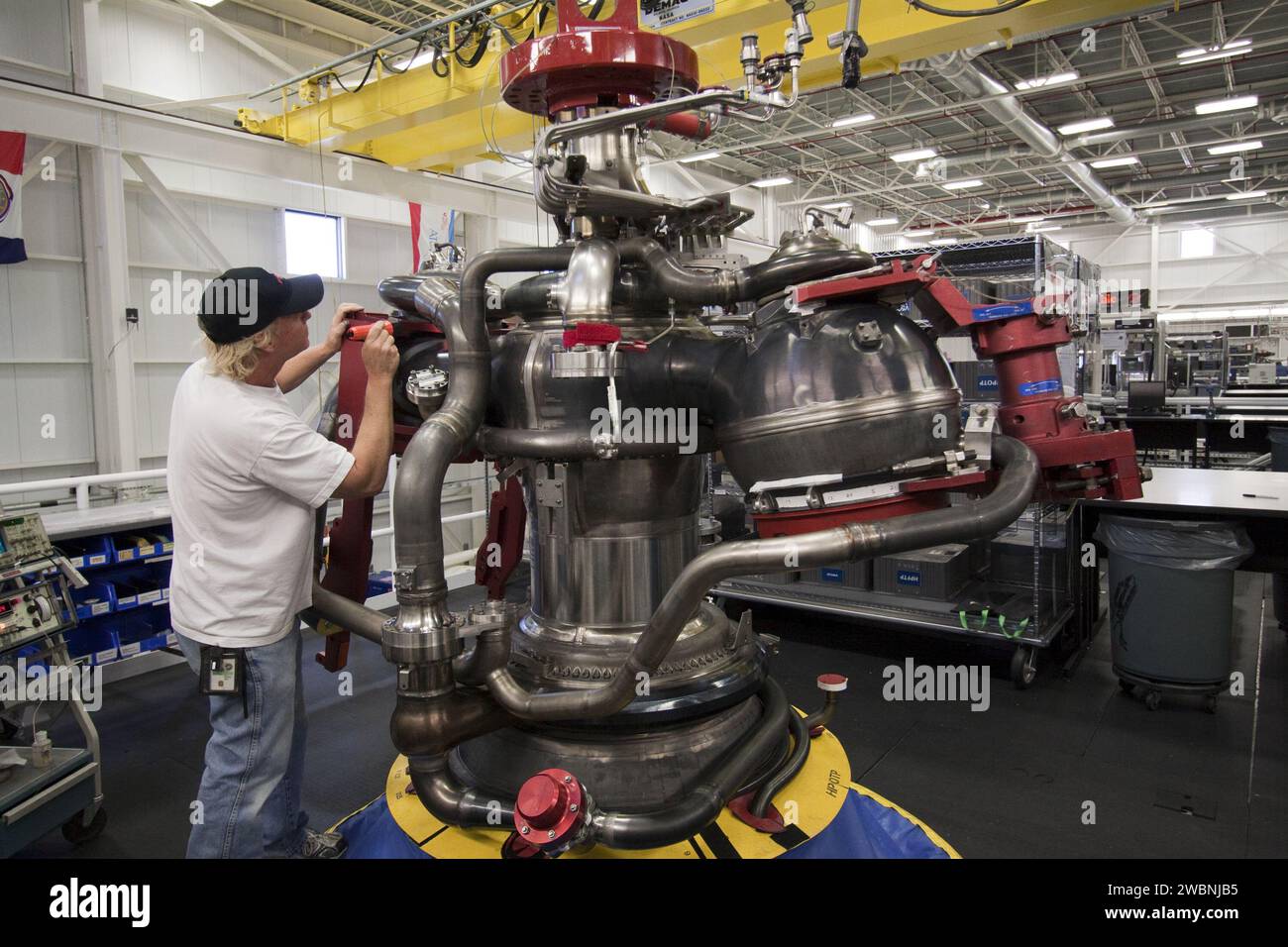 Pratt & Whitney Rocketdyne technician Ken Burley inspects Space Shuttle ...