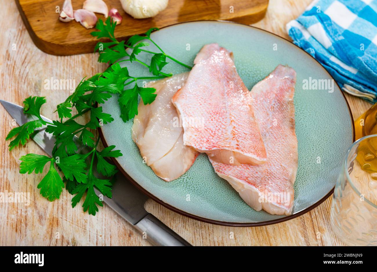 Fresh raw fillet of sea bass Stock Photo - Alamy
