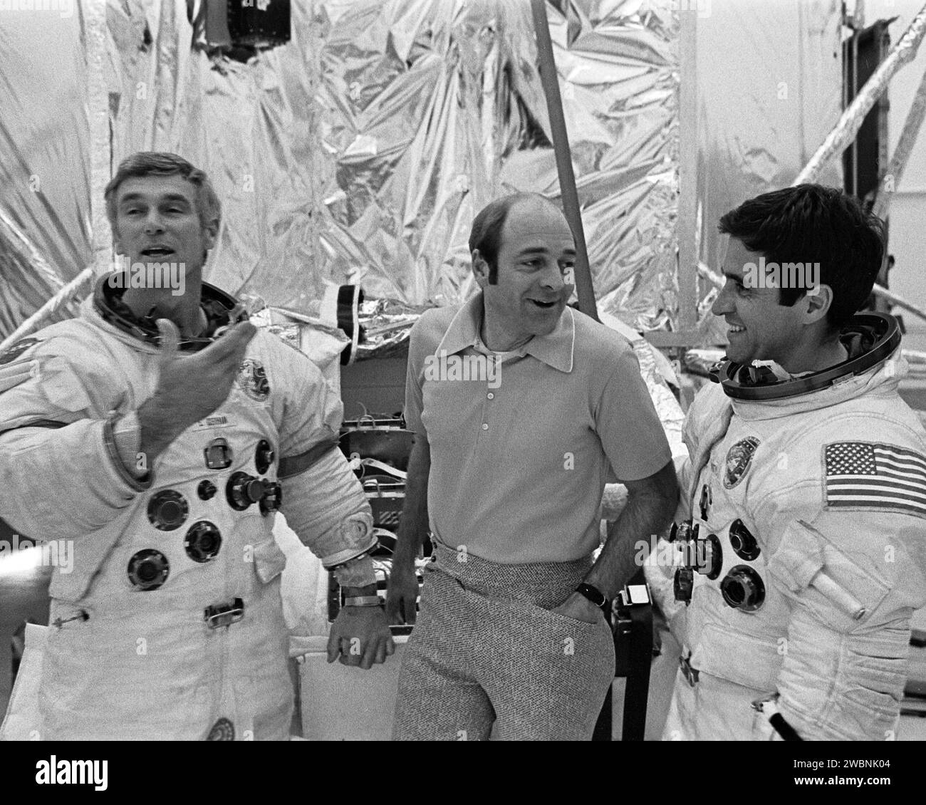 Apollo 17 Mission Commander Eugene A. Cernan, left, jokes with ...