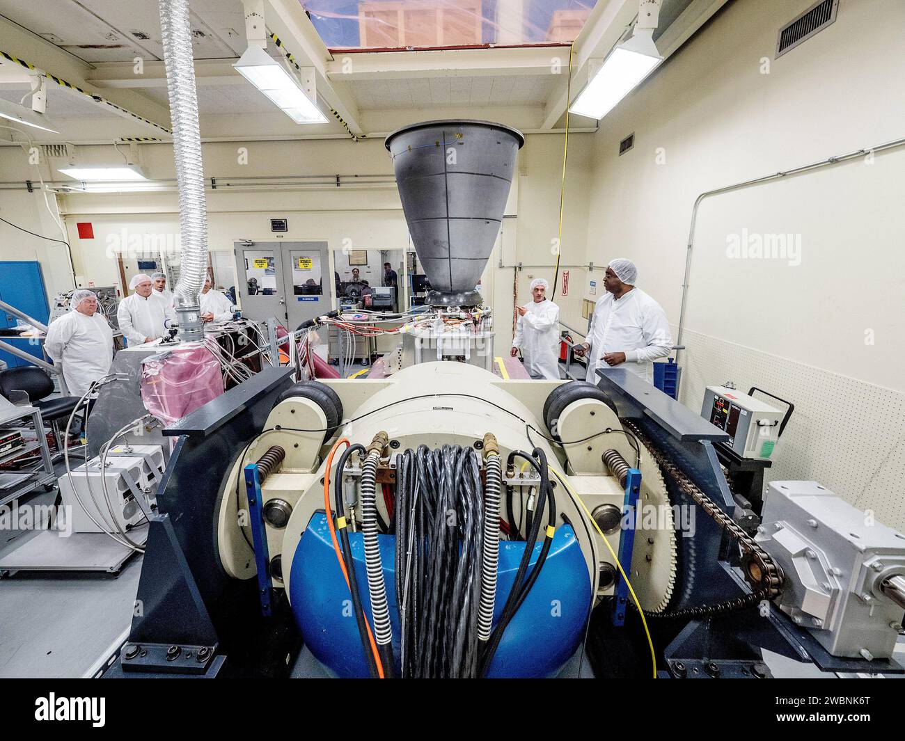 An Orbital Maneuvering System engine is vibration tested at NASA’s ...
