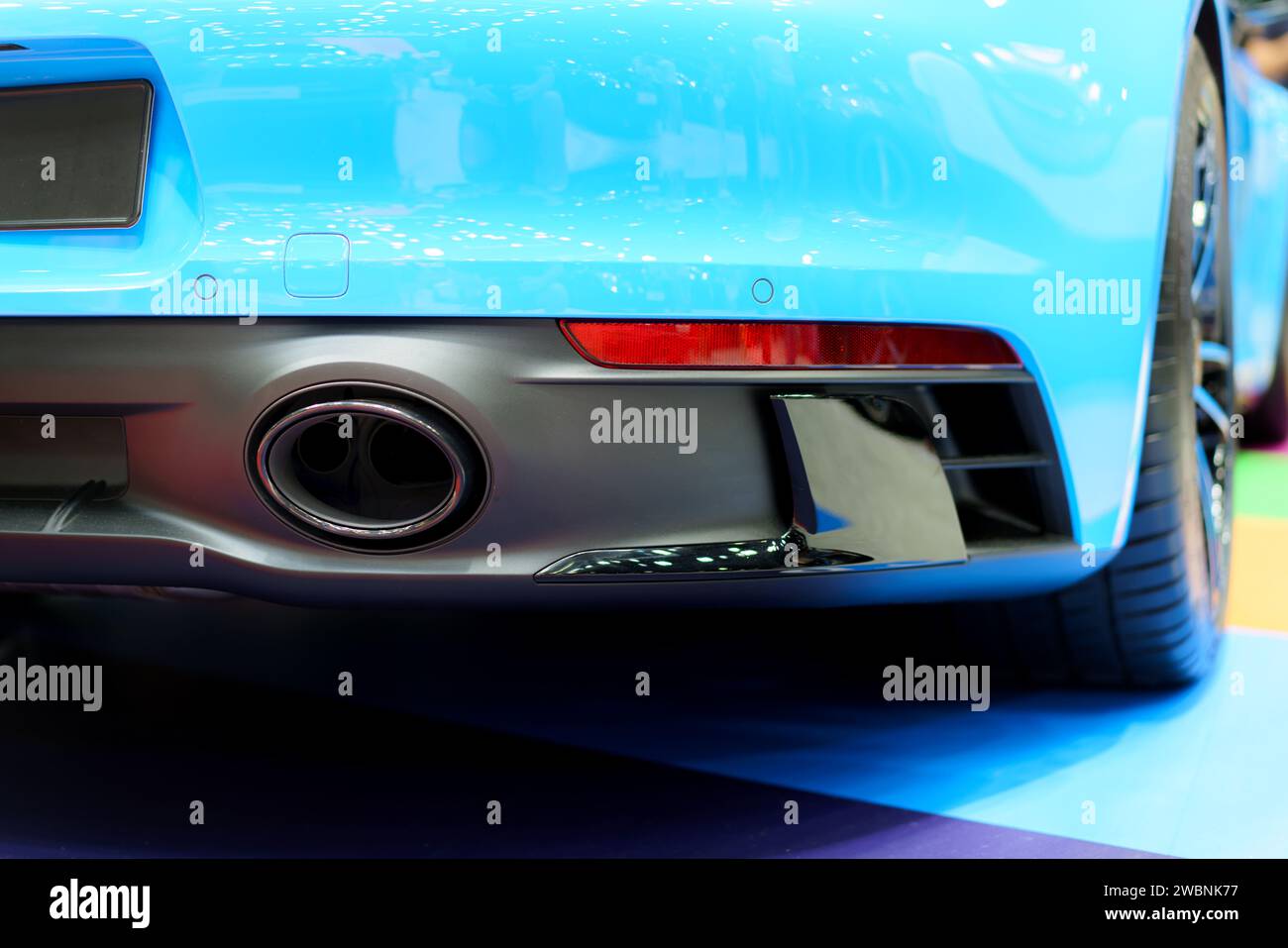 Intricate design of a sport car's exhaust pipe. This close-up view ...