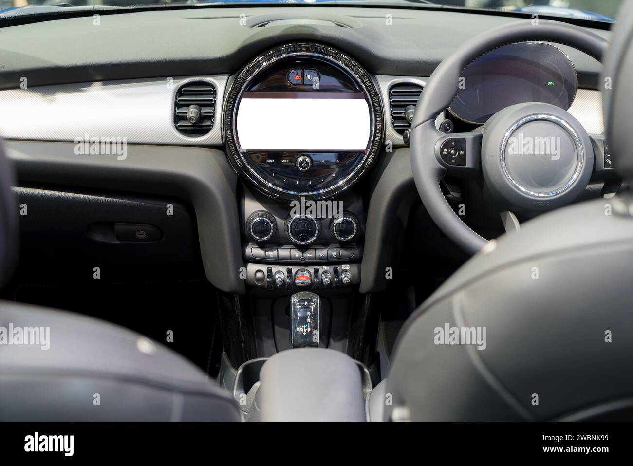 White mockup of a digital display screen on the dashboard of a modern ...