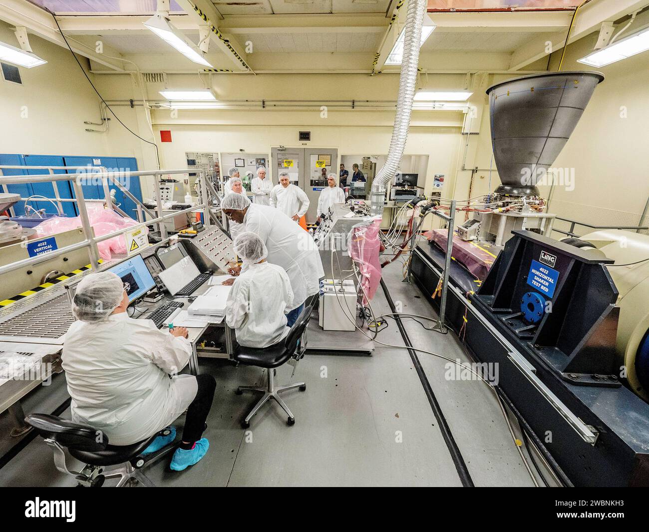 An Orbital Maneuvering System engine is vibration tested at NASA’s ...