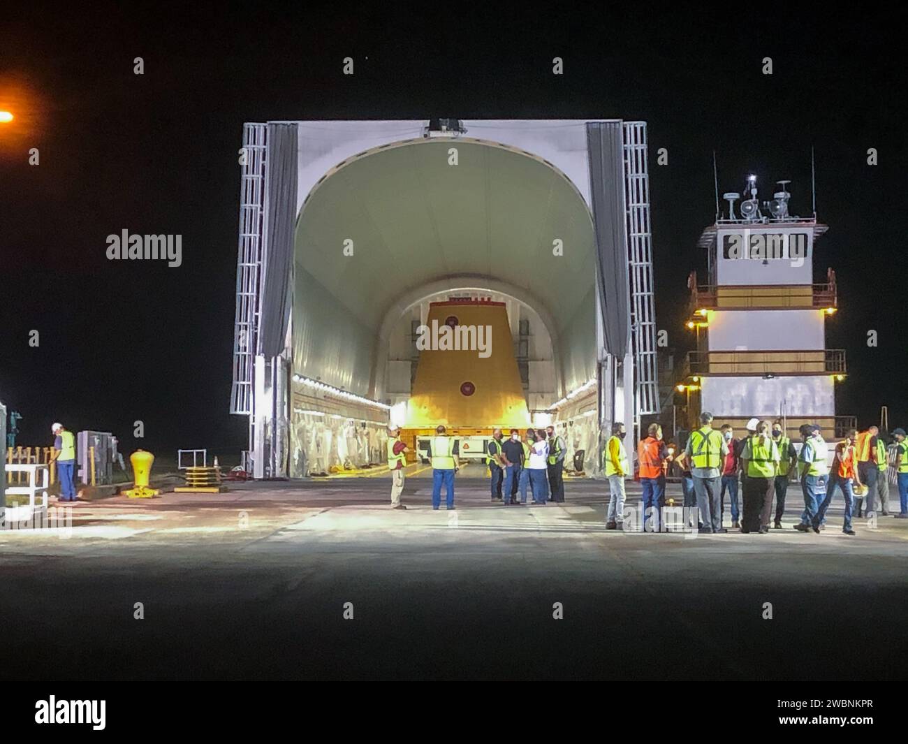 Technicians with NASA’s Exploration Ground Systems prepare to offload ...