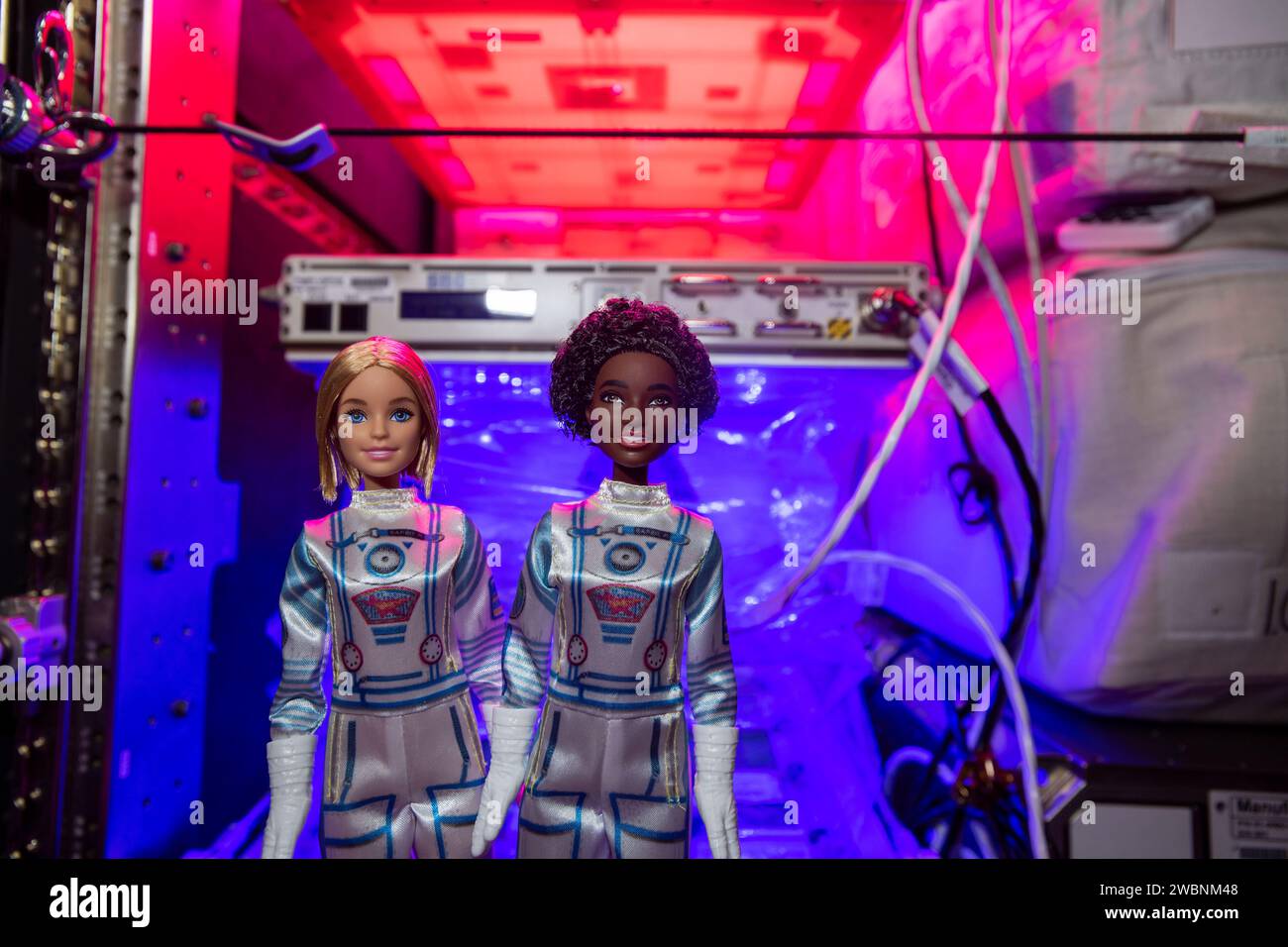iss066e155892 (3/1/2022) --- DreamStar dolls float in front of Astrobee ...