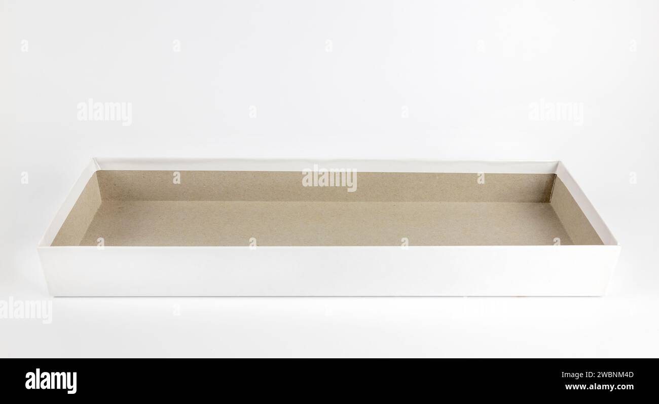 An empty rectangular white cardboard box. Layout for design and ...