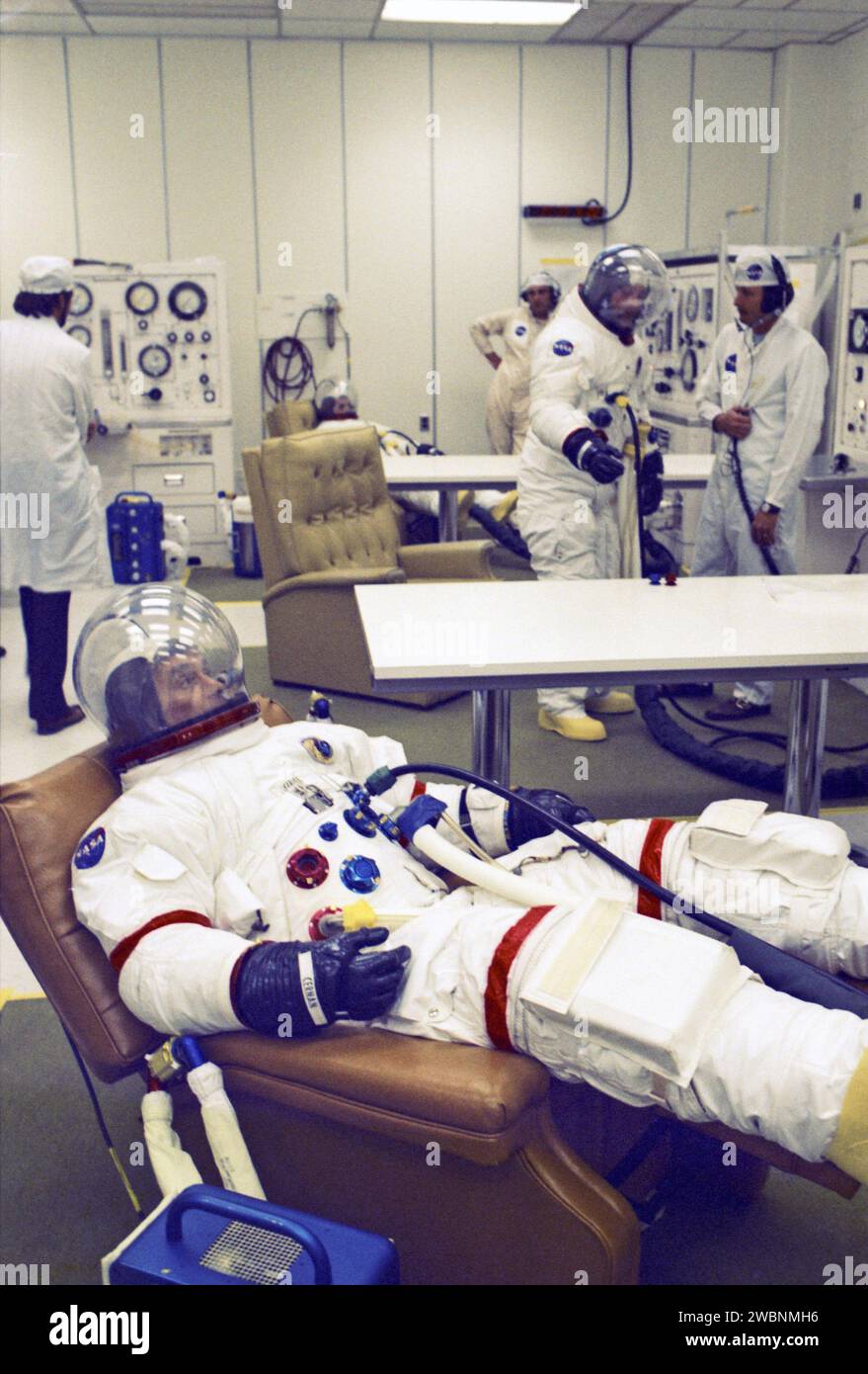 Apollo 17 Mission Commander Eugene A. Cernan undergoes spacesuit pressure checks today prior to ...