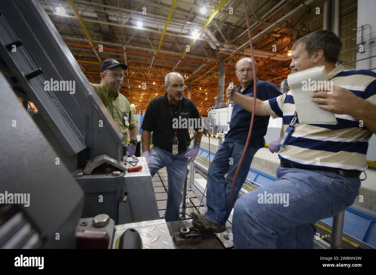 Technicians begin welding the Exploration Flight Test-1 (EFT-1) Orion ...