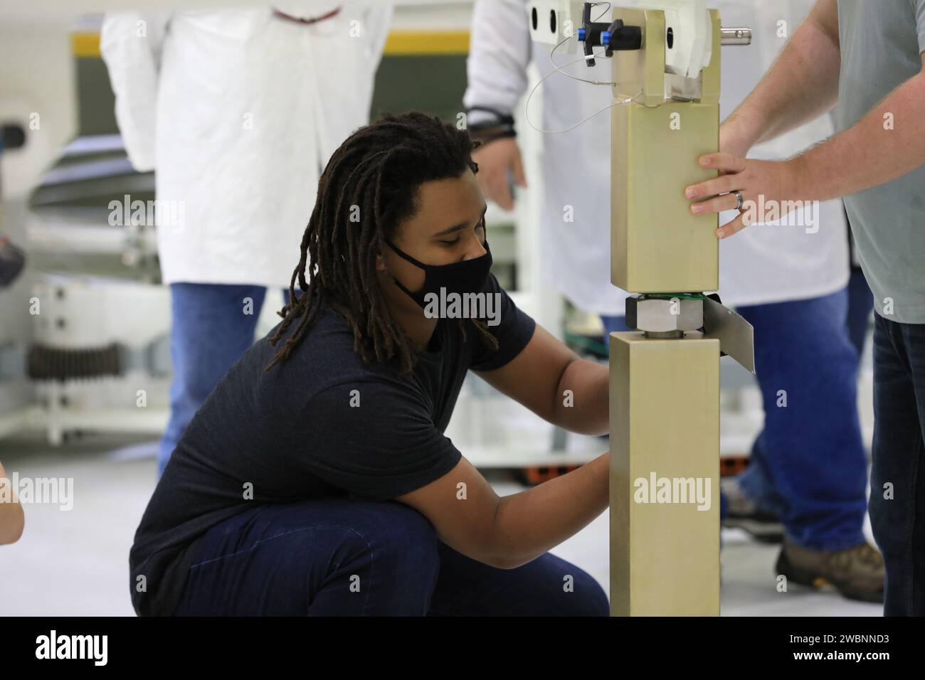 ASRC technician Nathaniel Bowman works to ready the Super Station ...