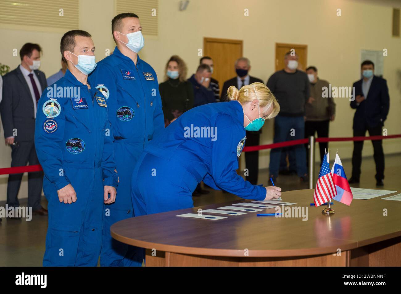 Expedition 64 crew member NASA astronaut Kate Rubins signs in for Soyuz ...