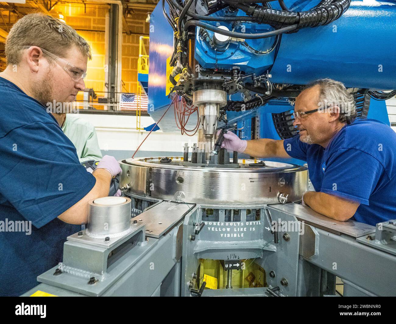Technicians complete the first weld on the Orion Exploration Mission 1 ...