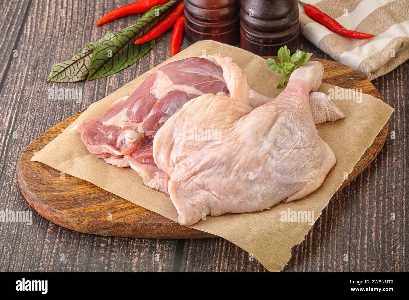Two Raw duck leg ready for cooking Stock Photo - Alamy