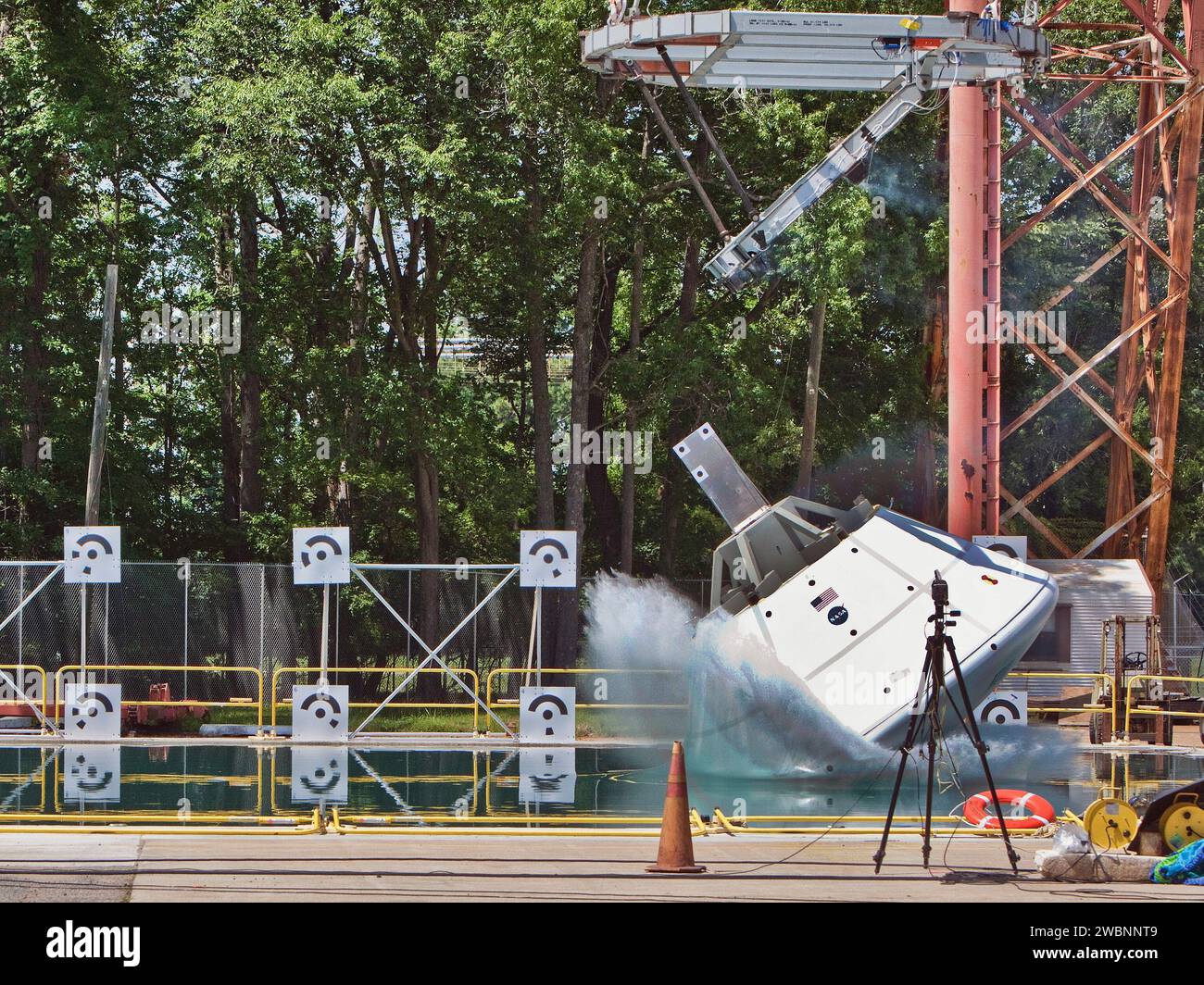 A 22,000-pound Orion test article is dropped into the Hydro Impact ...