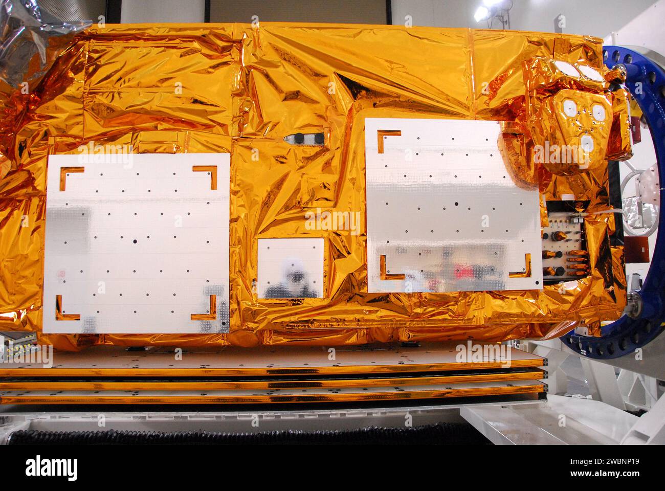 In a clean room inside the Astrotech Payload Processing Facility at ...