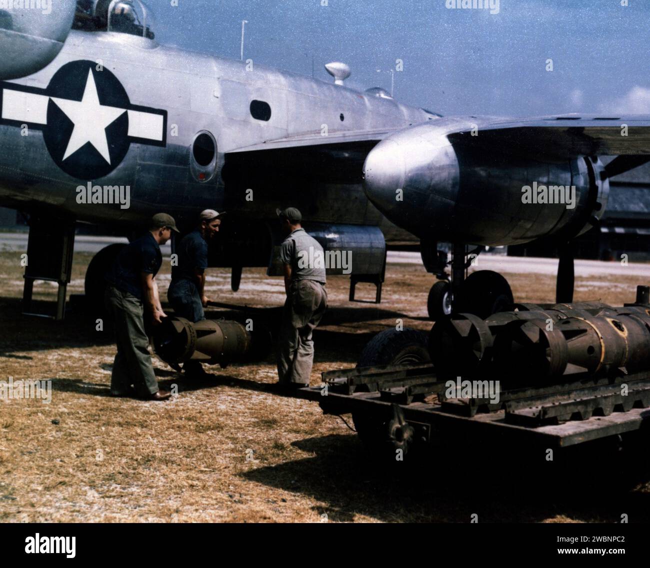Armorers Load 250 Lb. Depth Charges Into Bomb Bay Of A North American B ...