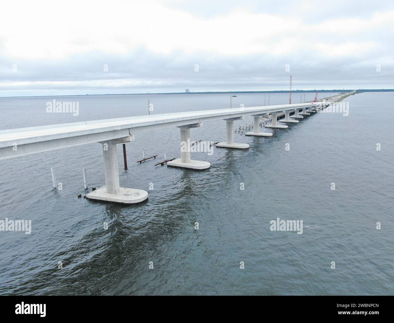 Crews with Orion Marine Construction work on the westbound span of the ...