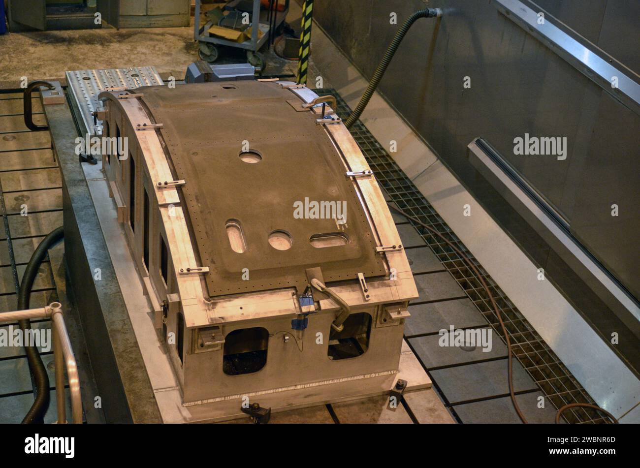 Technicians work on the composite crew module adapter (CMA) panels for ... Technicians work on the composite crew module adapter (CMA) panels for ...