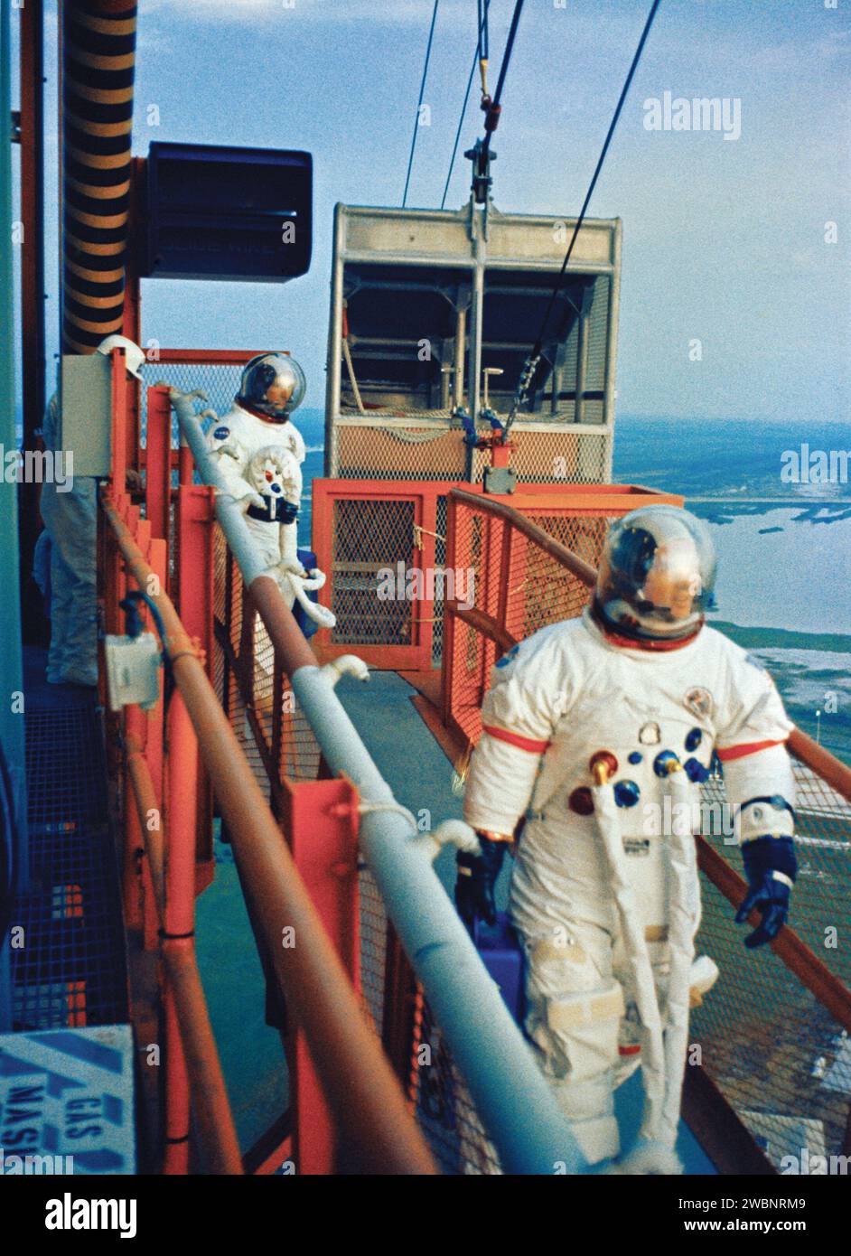 CAPE CANAVERAL, Fla. – The Apollo 15 crew walks around the launch tower ...