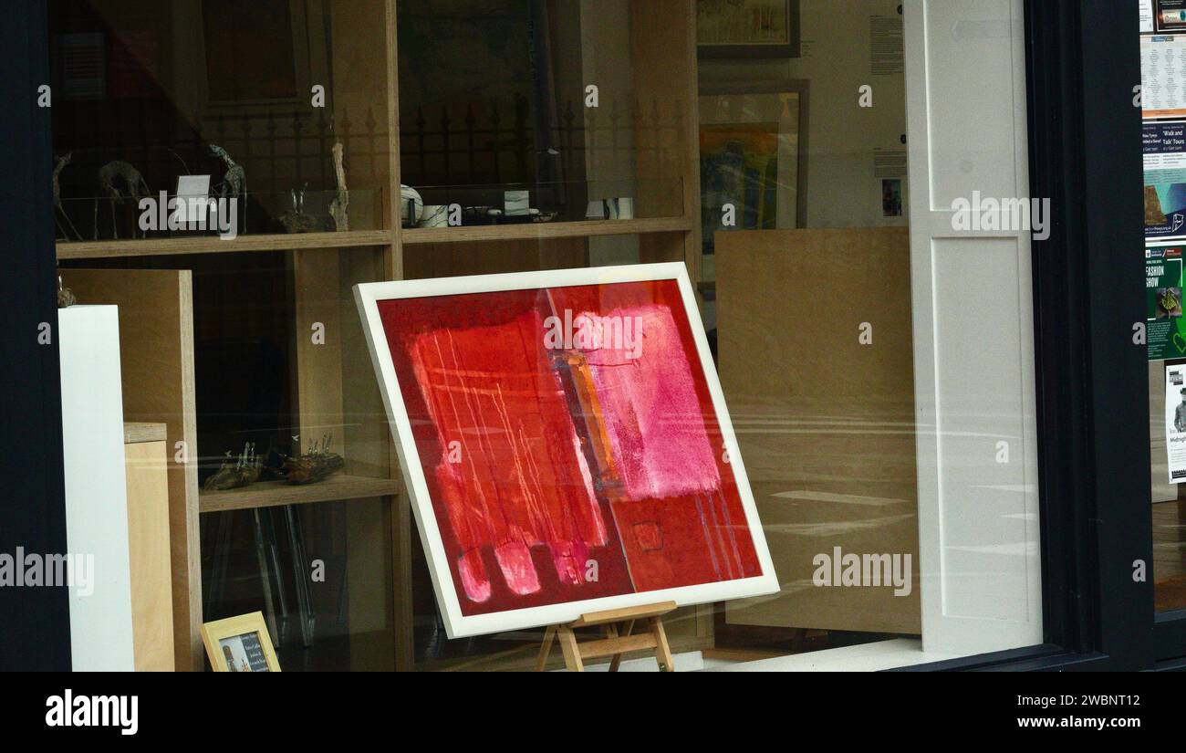 Window shopping in Brecon High Street: the shop windows are filled with ...