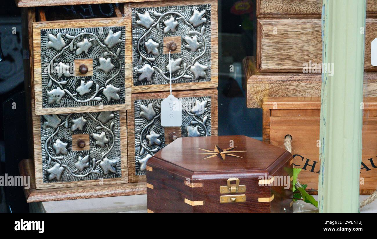 Window shopping in Brecon High Street: the shop windows are filled with ...