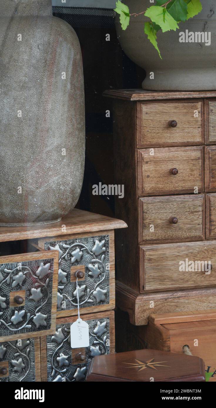 Window shopping in Brecon High Street: the shop windows are filled with ...