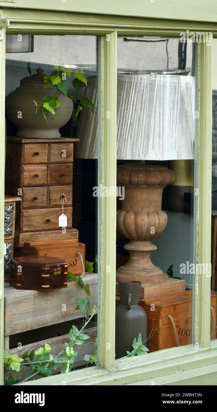 Window shopping in Brecon High Street: the shop windows are filled with ...