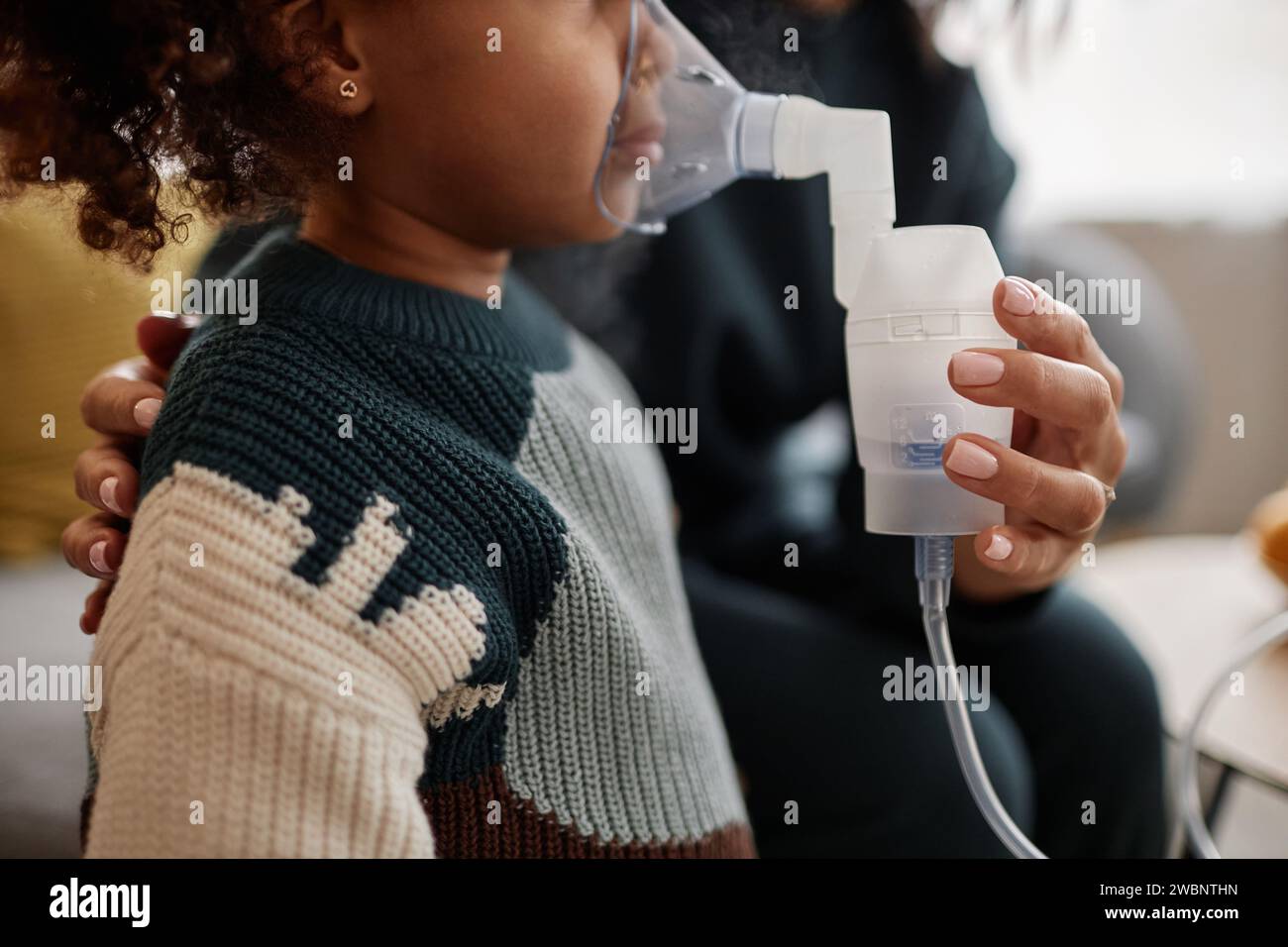 Little Child Doing Inhalation Procedure with Nebulizer Stock Photo - Alamy